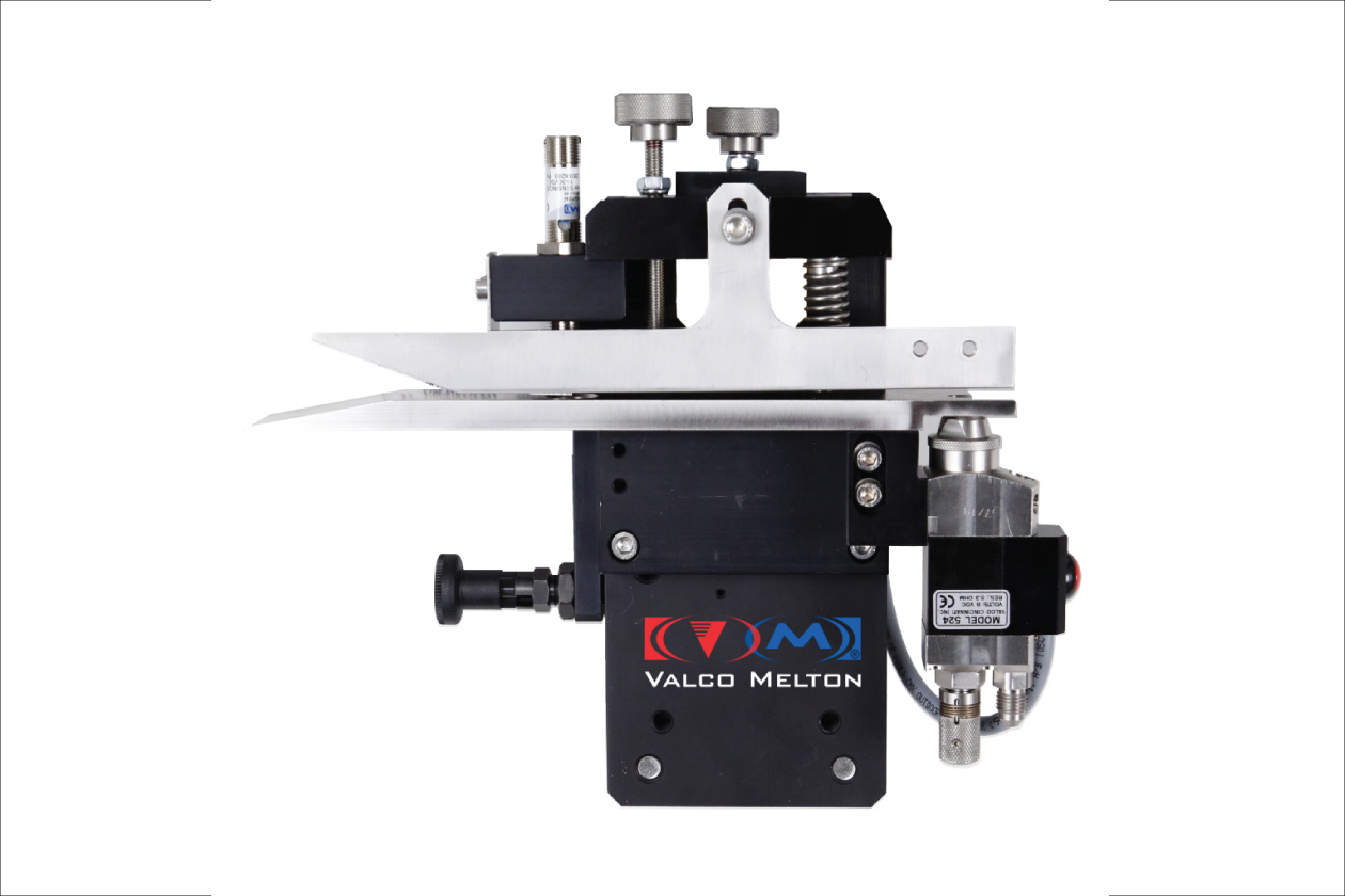 Valco Melton’s bottom-up gluing station for side-seam gluing ensures a ...